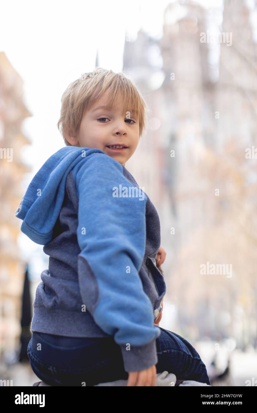 Cute little children tourists admiring Barcelona city, family travel ...