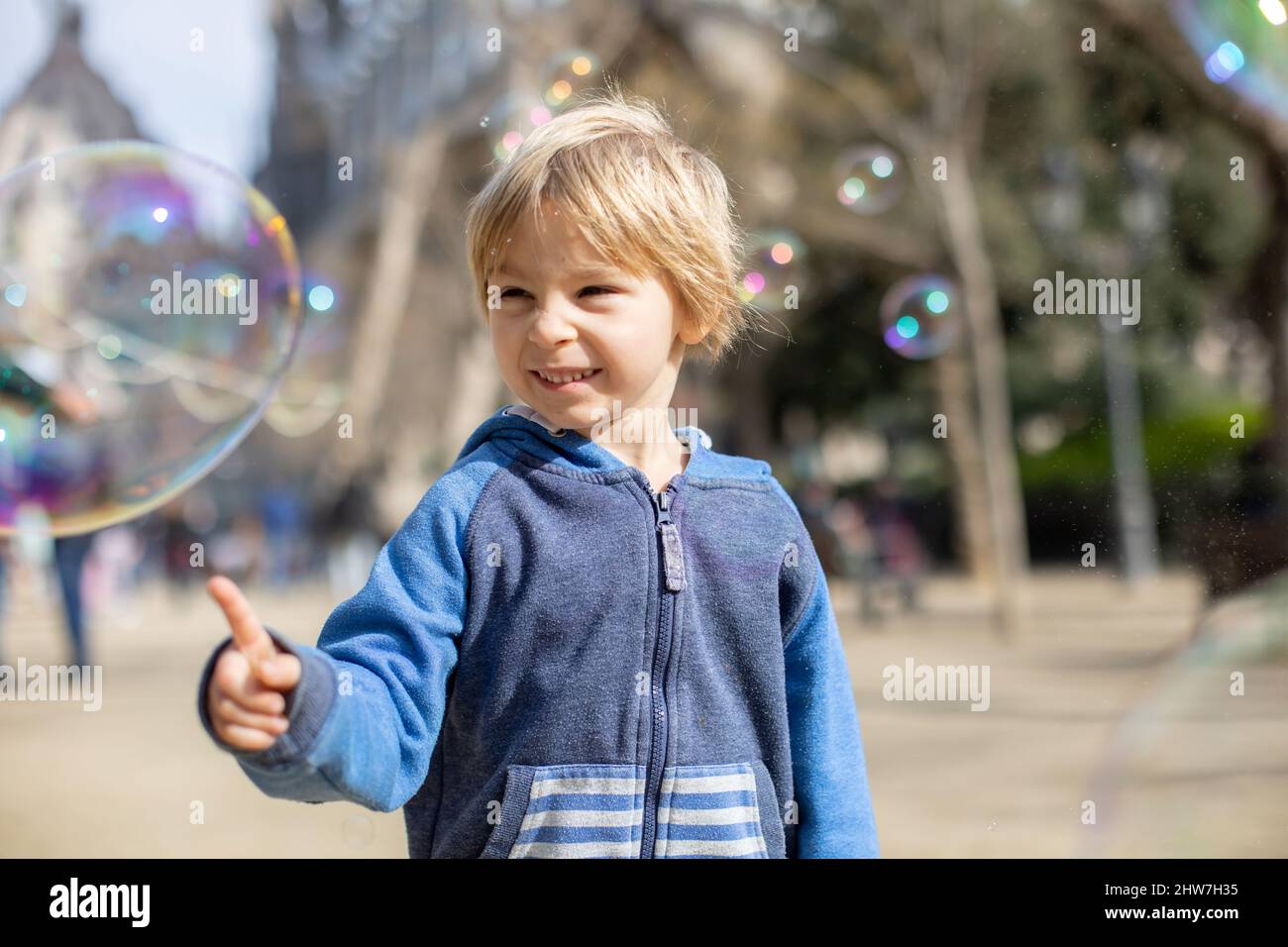 Cute little children tourists admiring Barcelona city, family travel ...