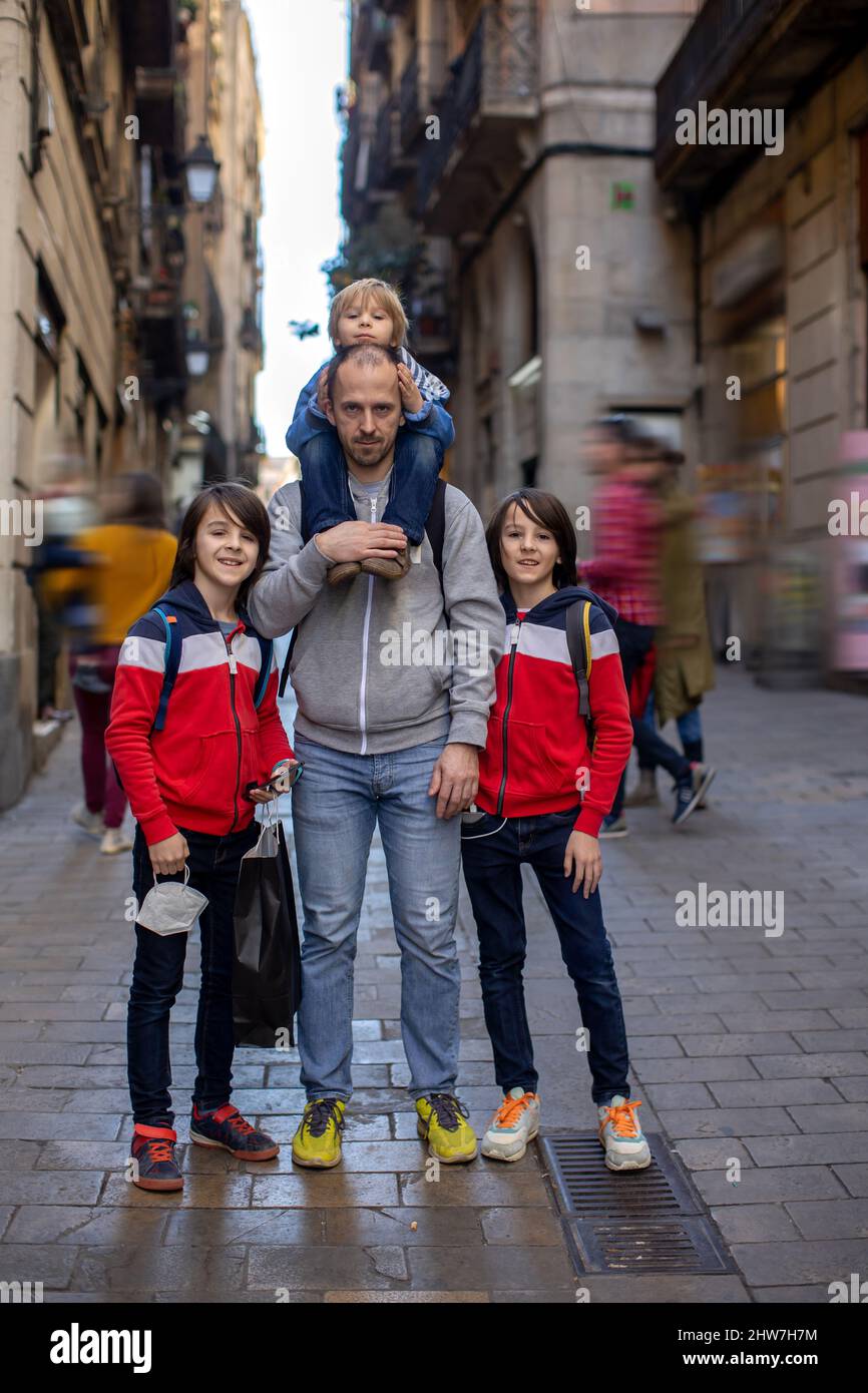 Cute little children tourists admiring Barcelona city, family travel ...