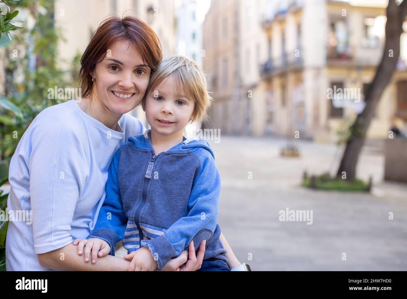 Cute little children tourists admiring Barcelona city, family travel ...