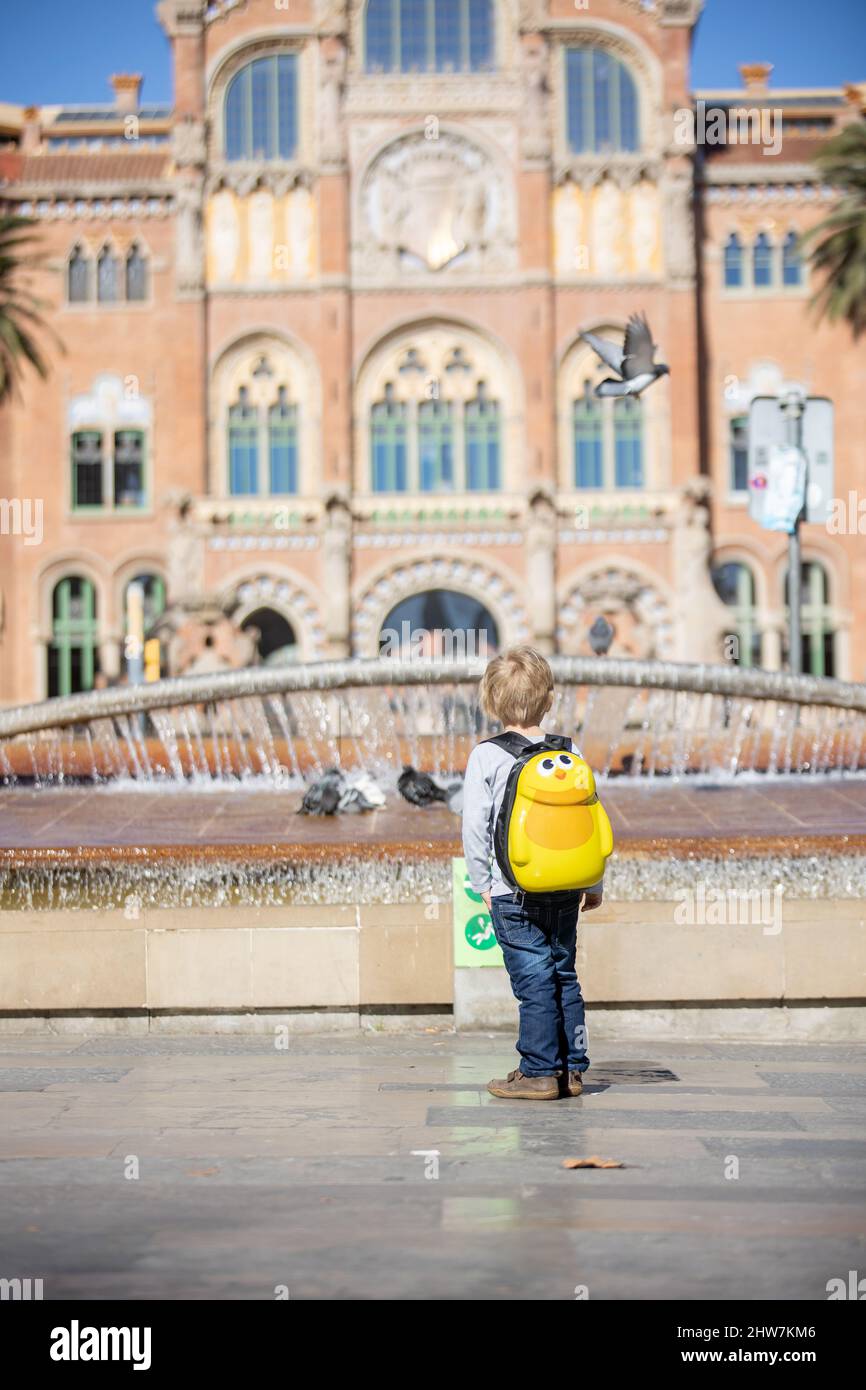 Cute little child tourist, admiring Barcelona city, family travel with ...