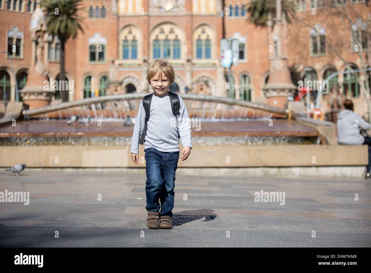 Cute little child tourist, admiring Barcelona city, family travel with ...