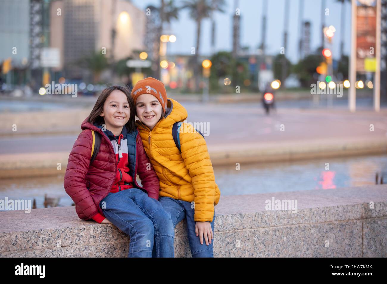 Cute little children tourists admiring Barcelona city, family travel ...