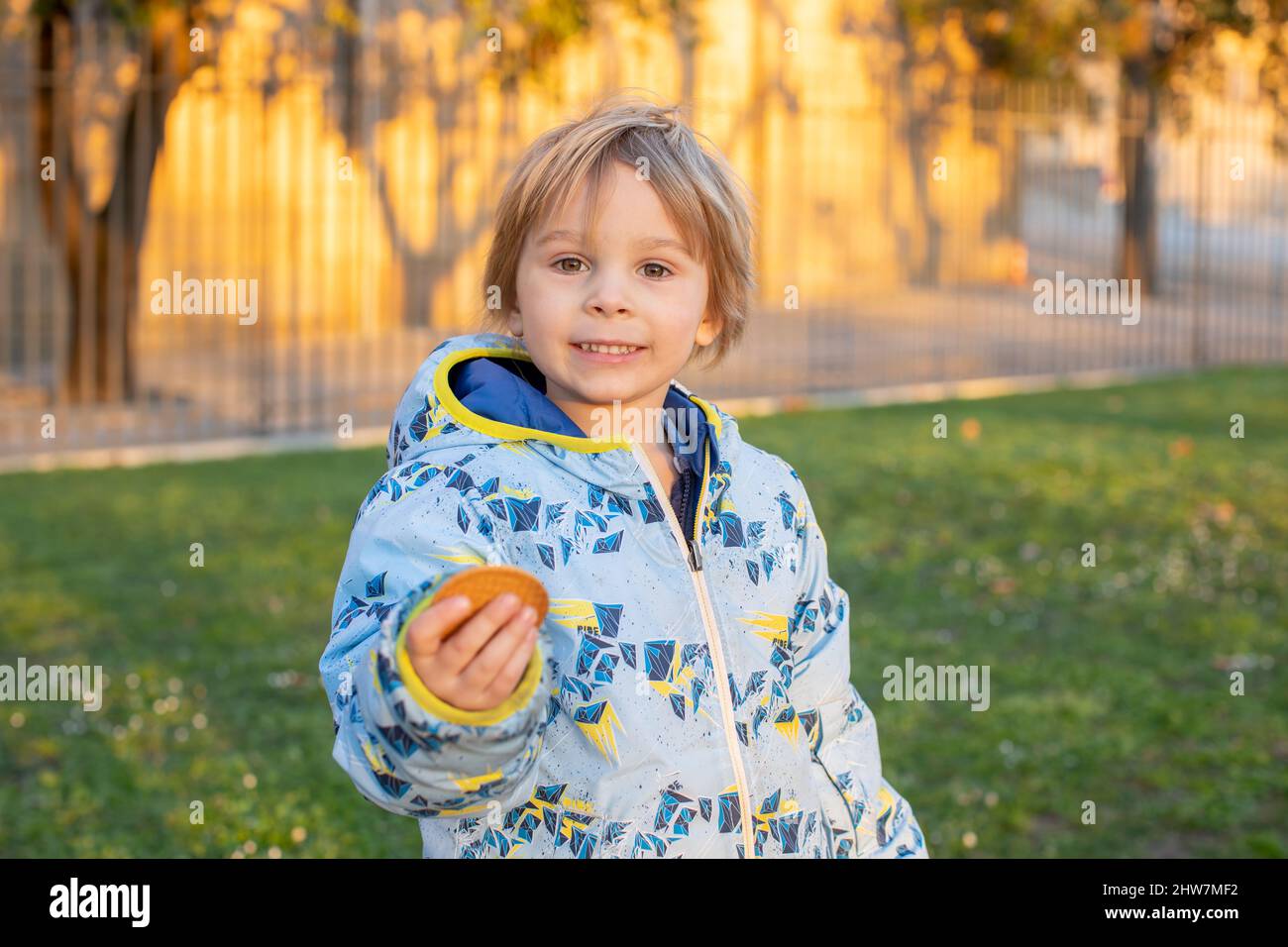 Children, playing in front of the Catalona national museum on Montjuic ...