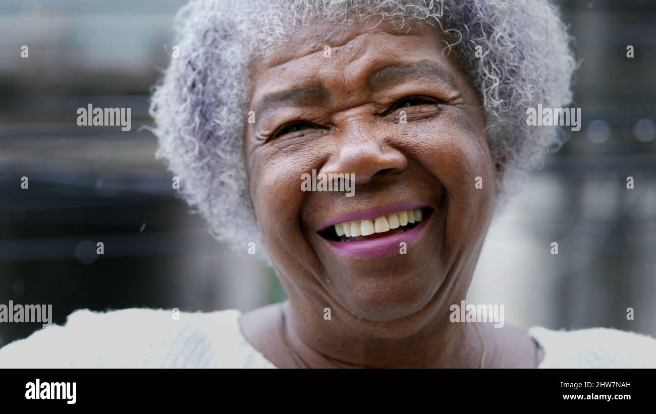 A joyful older black woman authentic smile real happy expression Stock ...