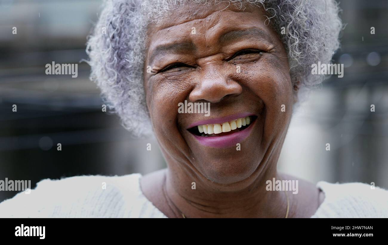 A joyful older black woman authentic smile real happy expression Stock ...