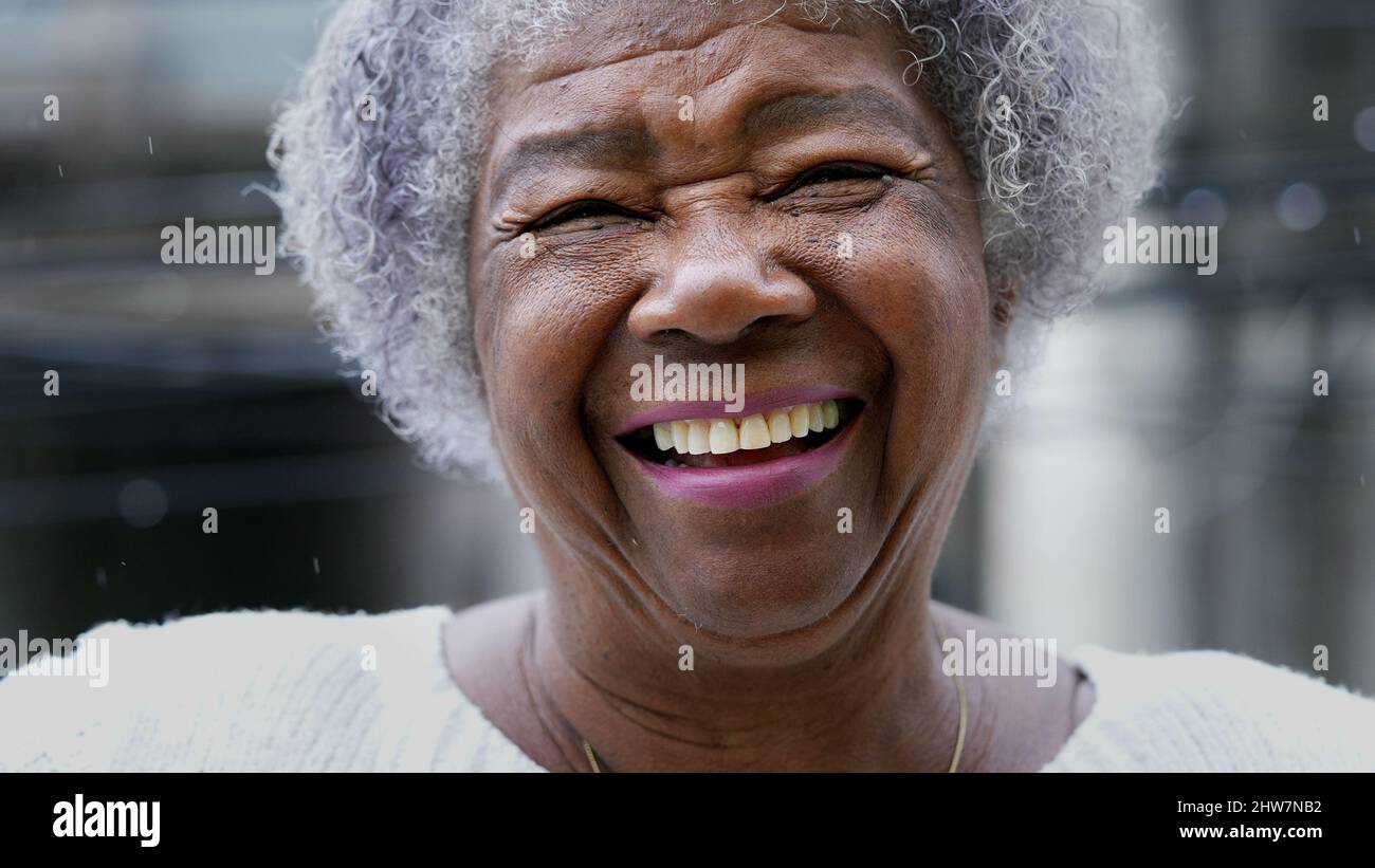 A joyful older black woman authentic smile real happy expression Stock ...
