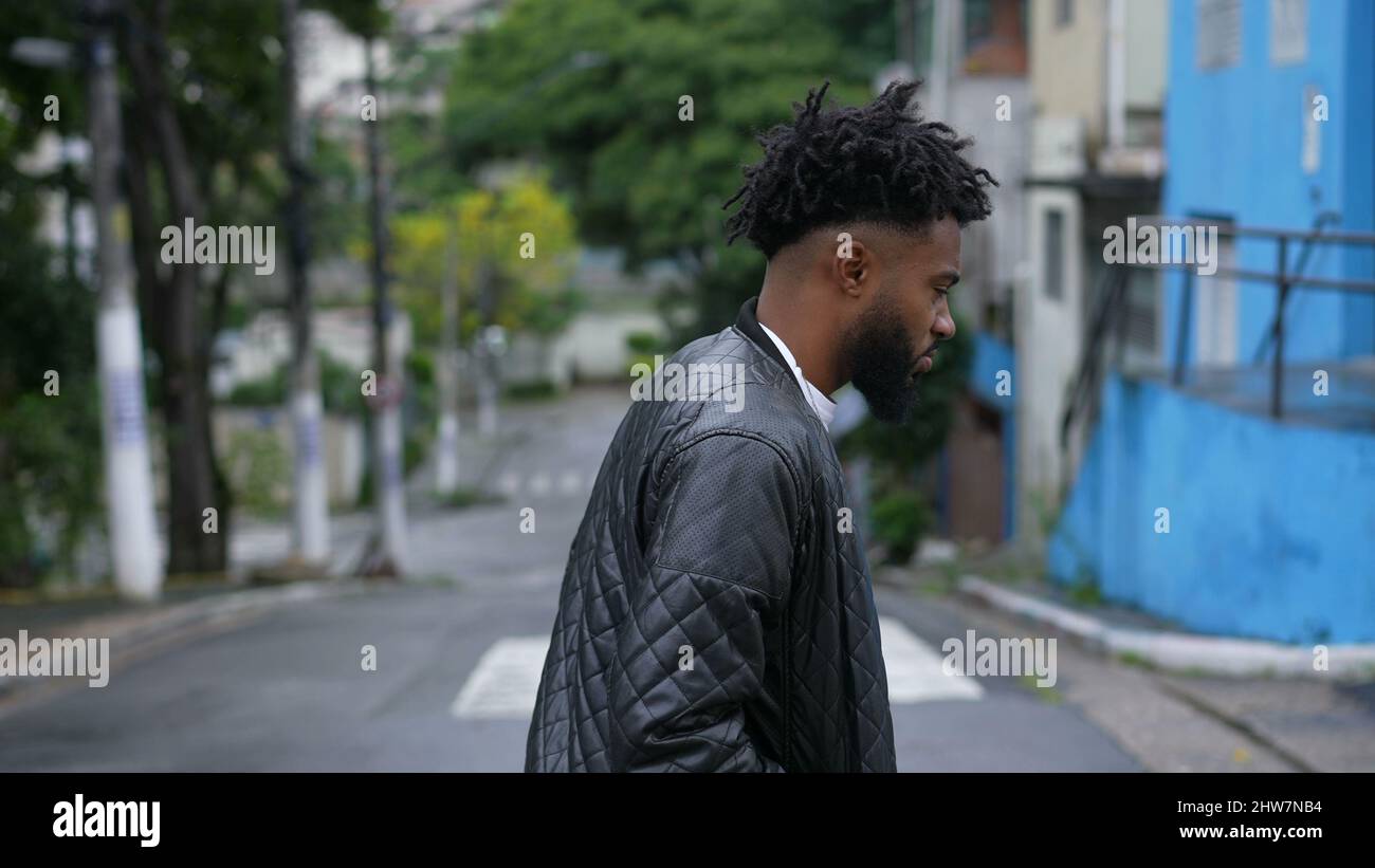 One pensive brazilian man standing hi-res stock photography and images ...