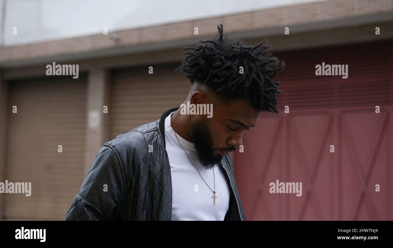Slow motion lonely man walking hi-res stock photography and images - Alamy