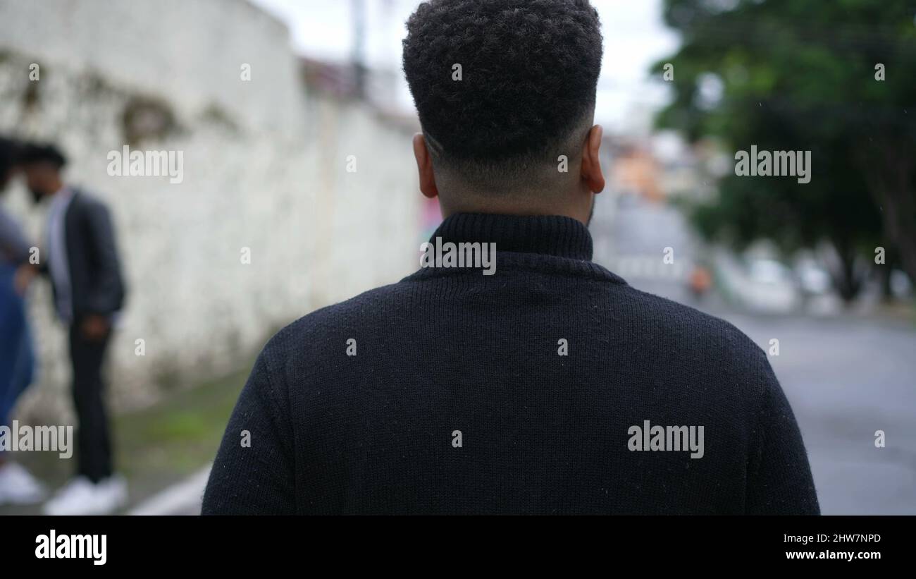 Man standing outside looking up to sky thoughtful person looks up Stock ...