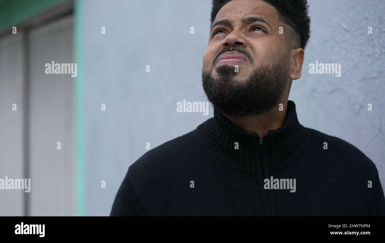 One pensive brazilian man standing hi-res stock photography and images ...