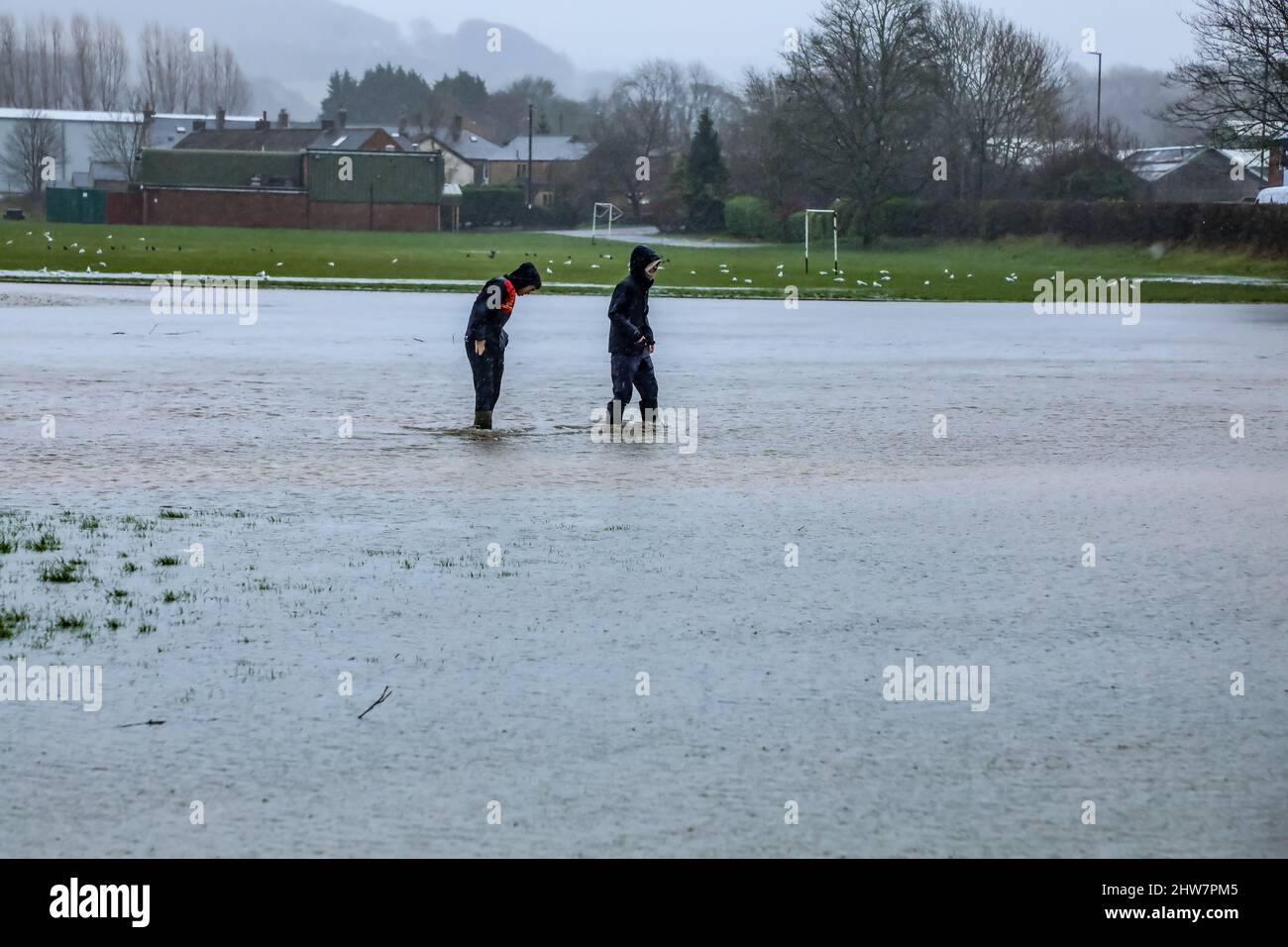 Boys wading hi-res stock photography and images - Alamy