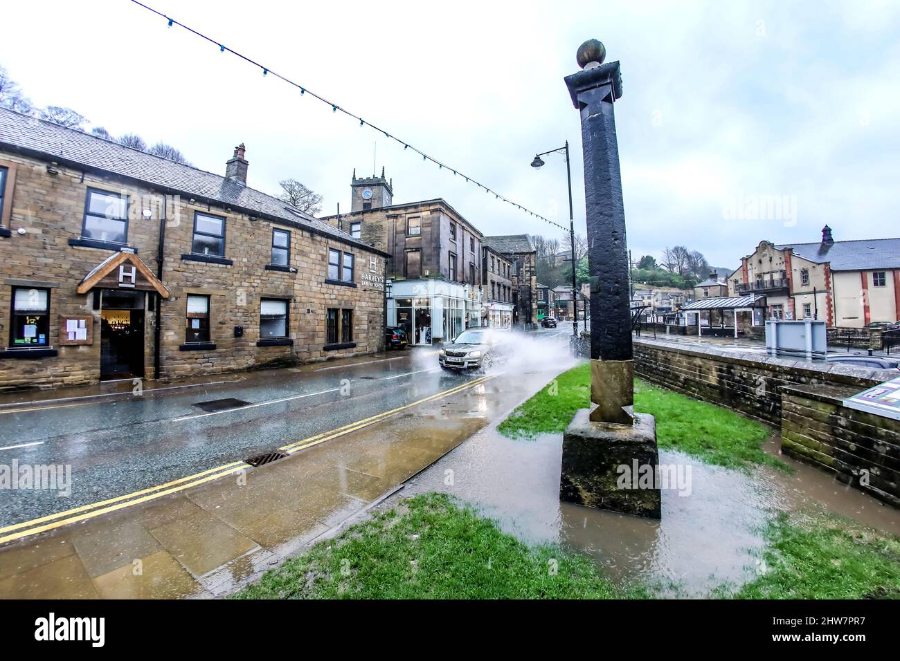 Traffic struggles, through flood water in Holmfirth, West Yorkshire ...