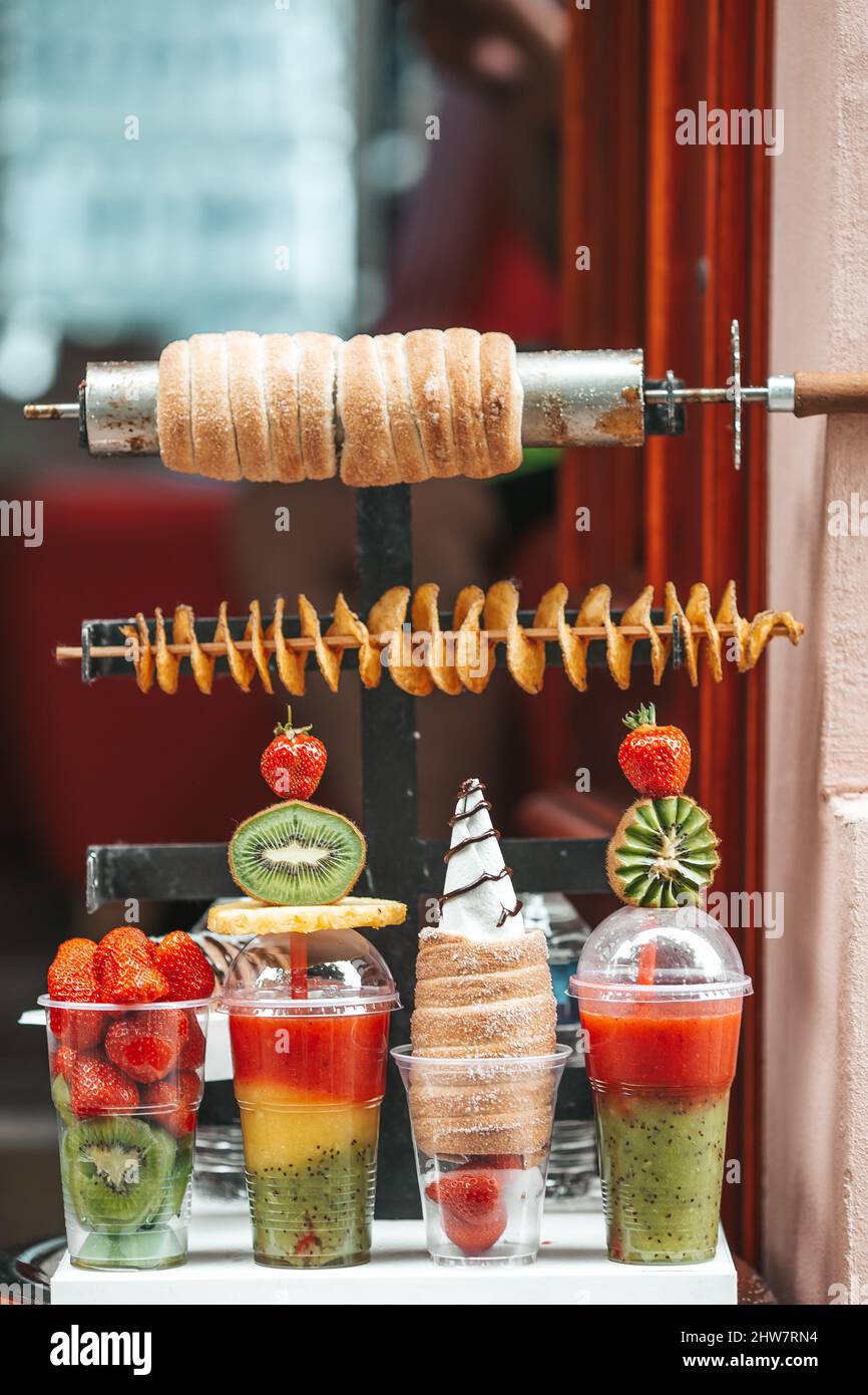 Trdelnik is a traditional food in Czech Republic. Street food outdoors ...