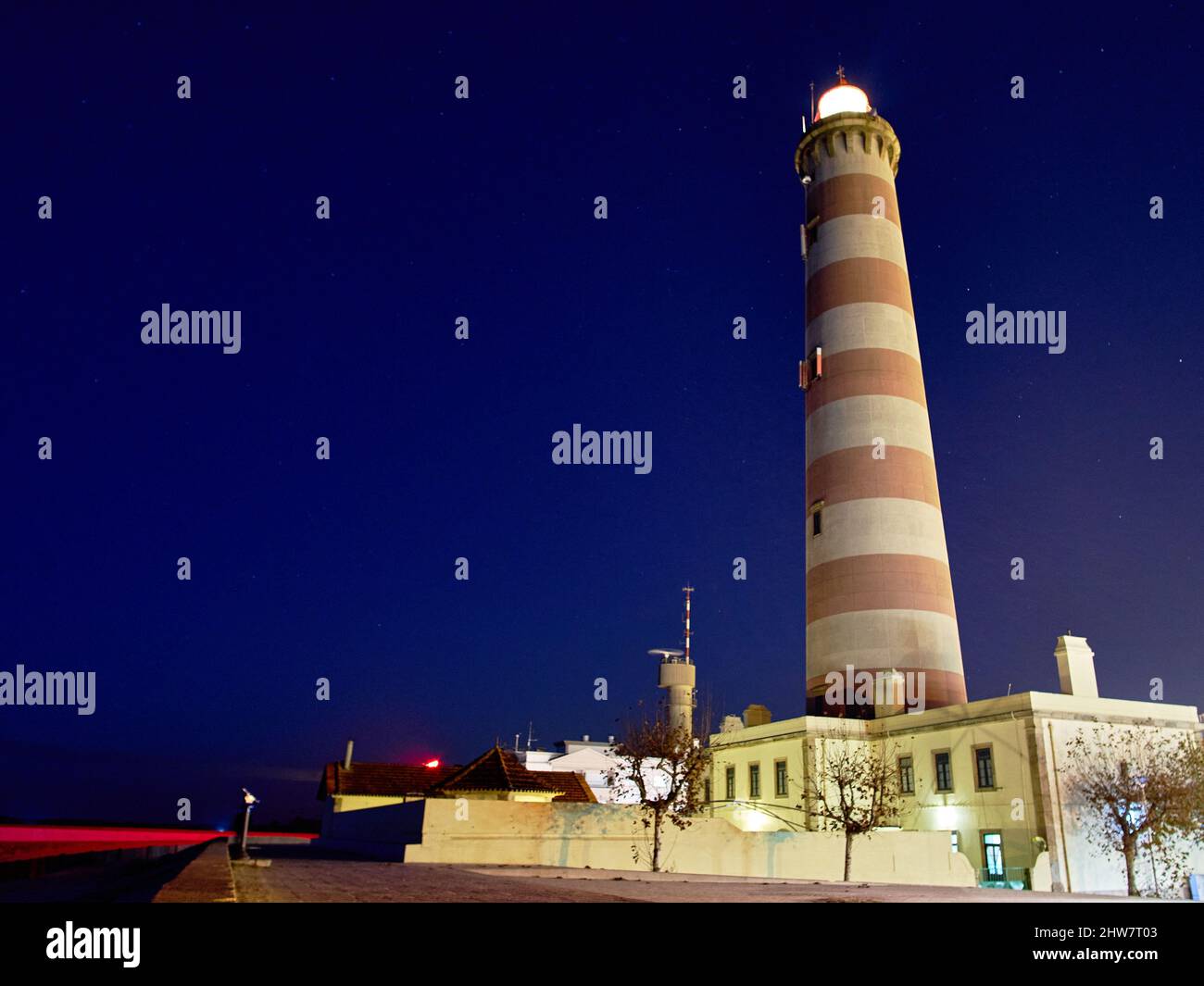 Scenic view of the biggest lighthouse in Portugal against the blue ...