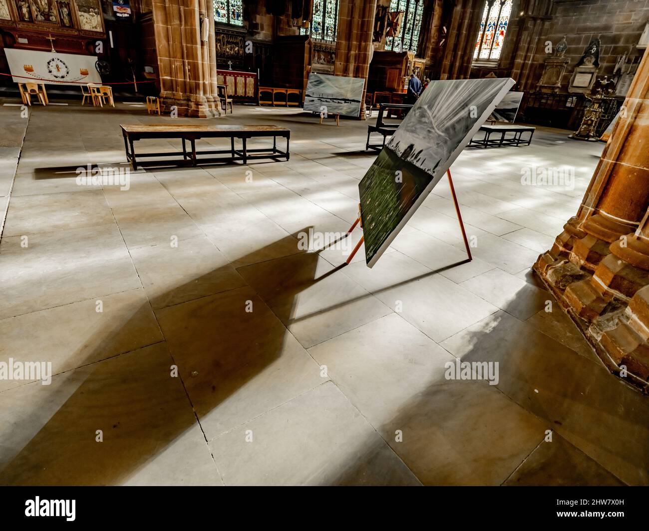 Artwork casting a long shadow of a paintinh in Chester Cathedral, a ...