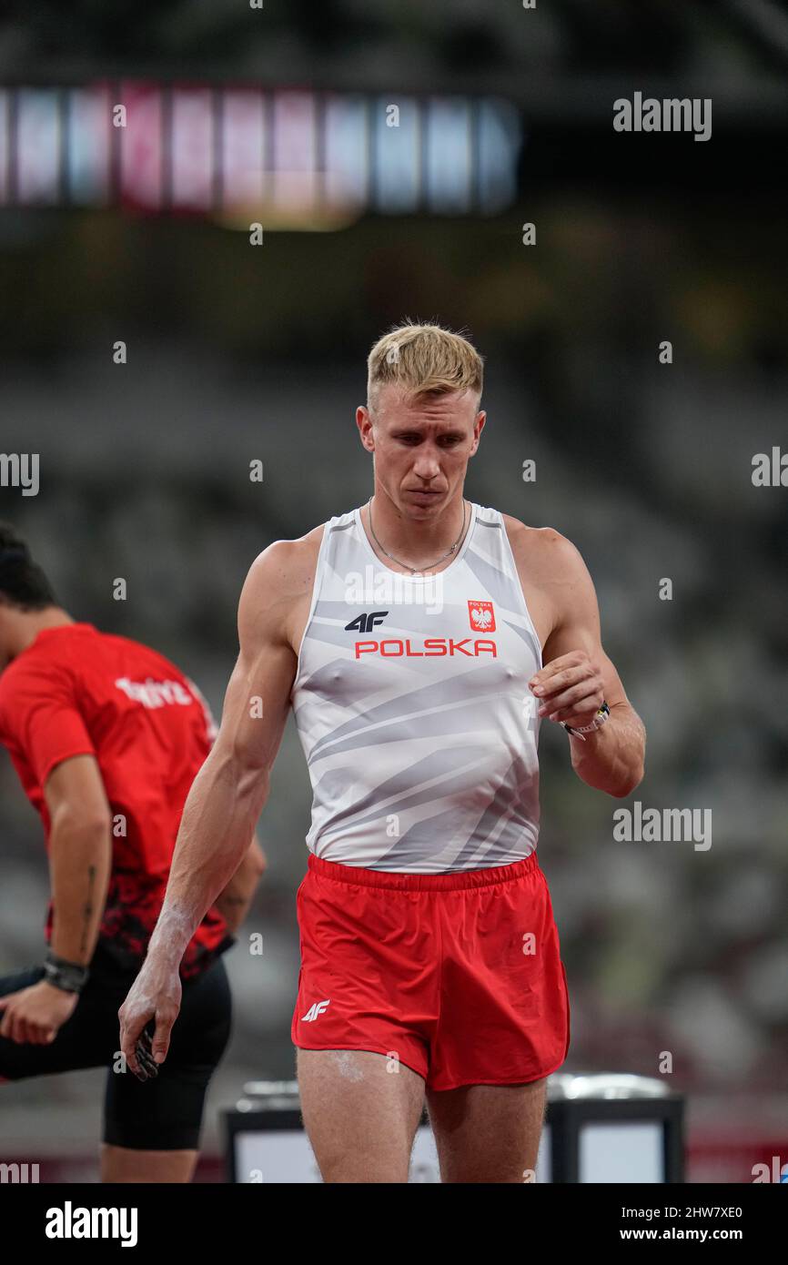 Piotr Lisek participating in the Tokyo 2020 Olympics in the pole vault ...