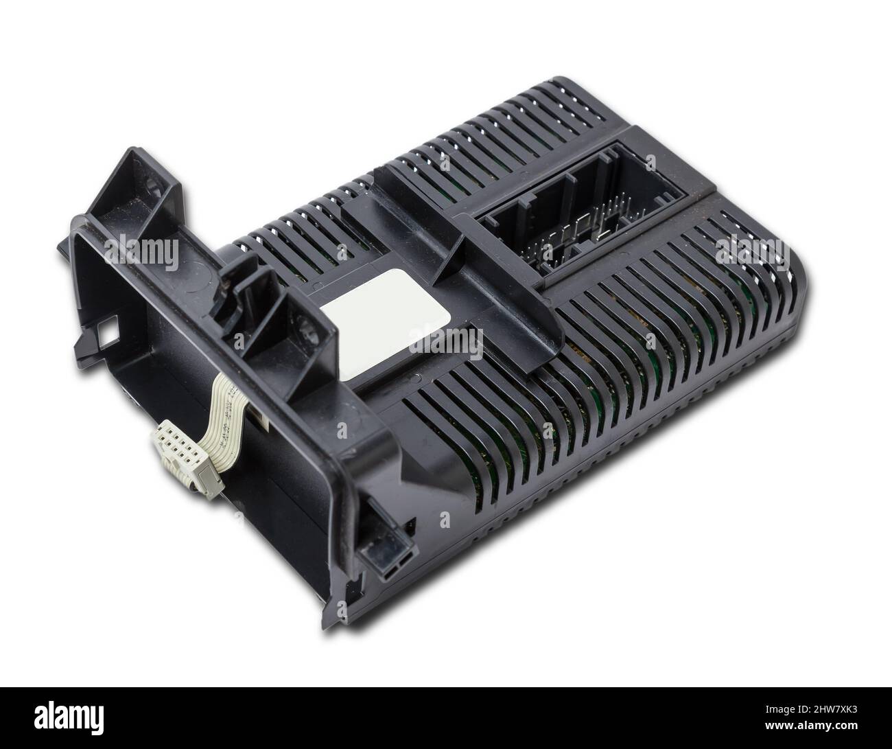 Plastic car engine control unit with plastic elements on a white ...