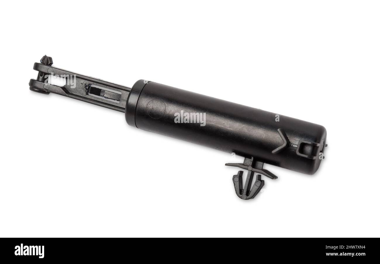 black plastic shock absorber - detail of a car mechanism on a white ...