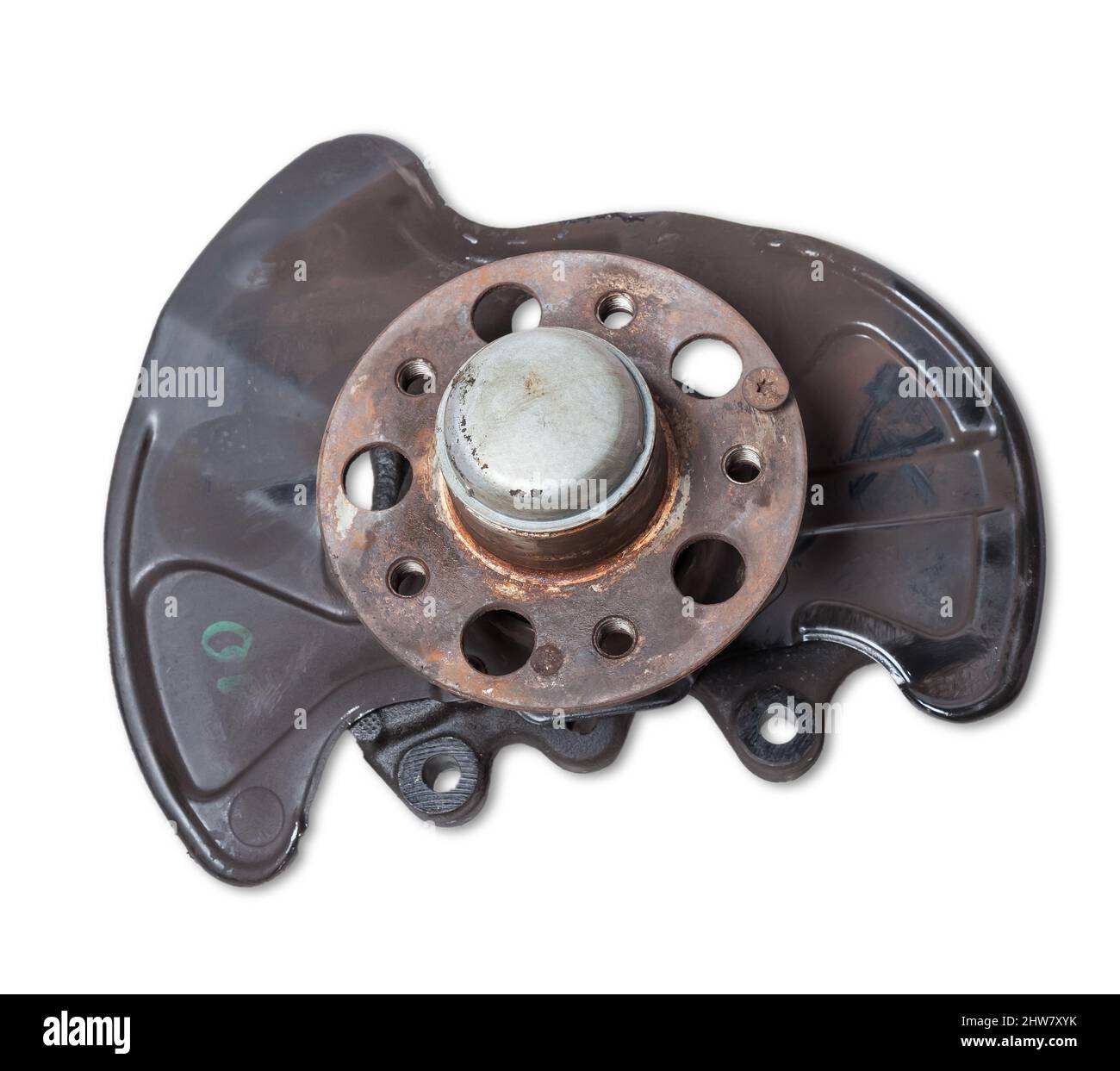 A close-up of a worn metal wheel hub with oil and rust elements on a ...
