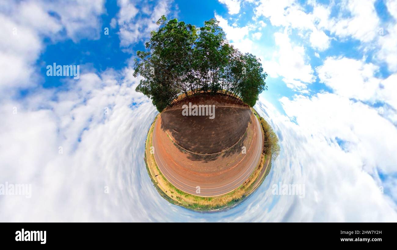 Small planet with trees, white clouds and soft blue sky. Green 360 Tiny ...