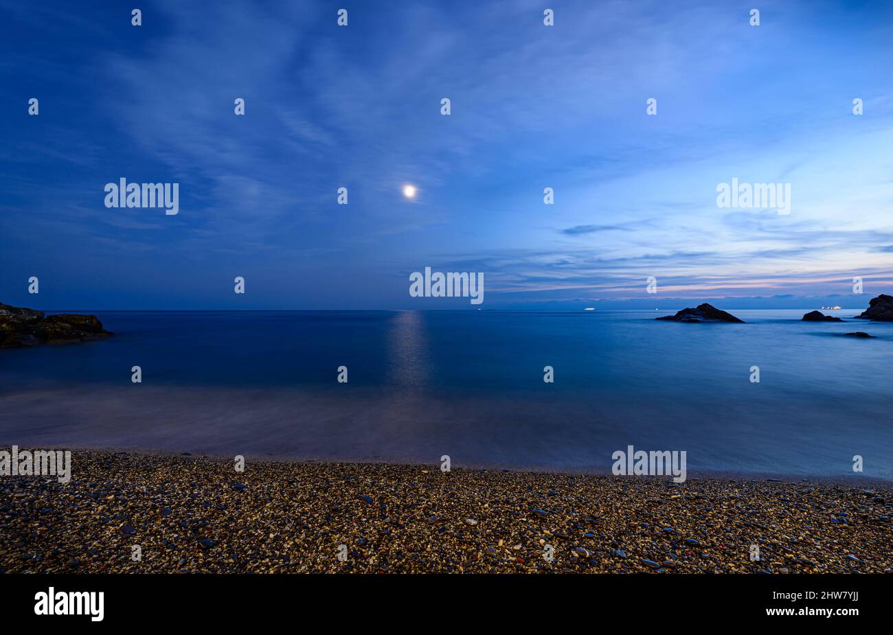 Sea at Night. Mediterranean coast. Pebbles on the beach. Liguria in ...