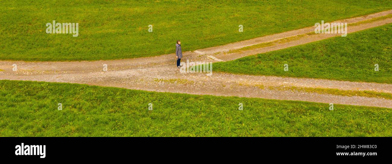 Woman at the crossroads. Aerial view Stock Photo - Alamy