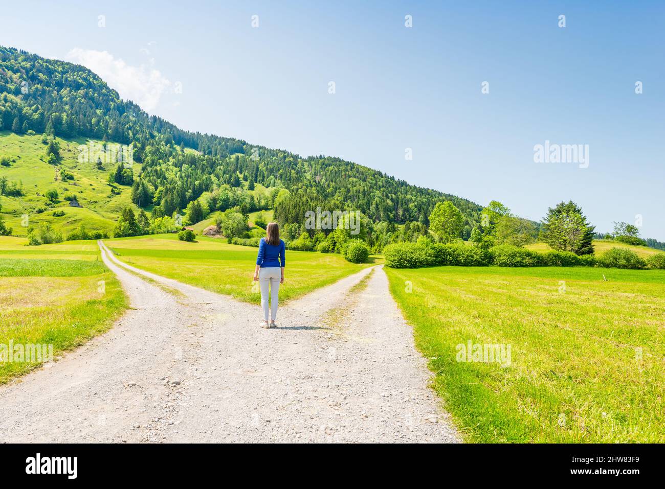 At the intersection of roads. The symbol is to make a choice. Female ...