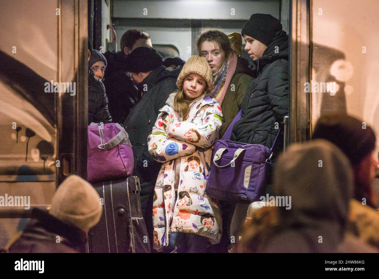 A girl looks out from the train that arrived from Ukraine to Przemysl ...