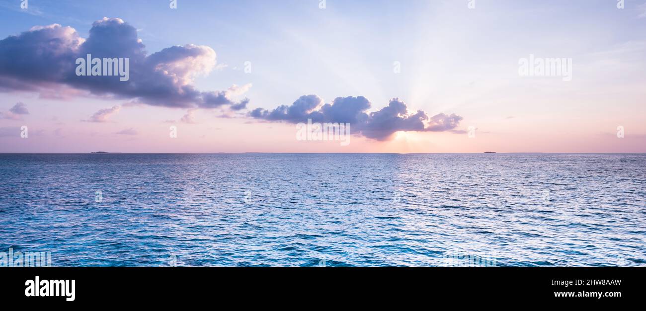 Gentle impressive ocean at sunset. Maldives. Tropical island Stock ...