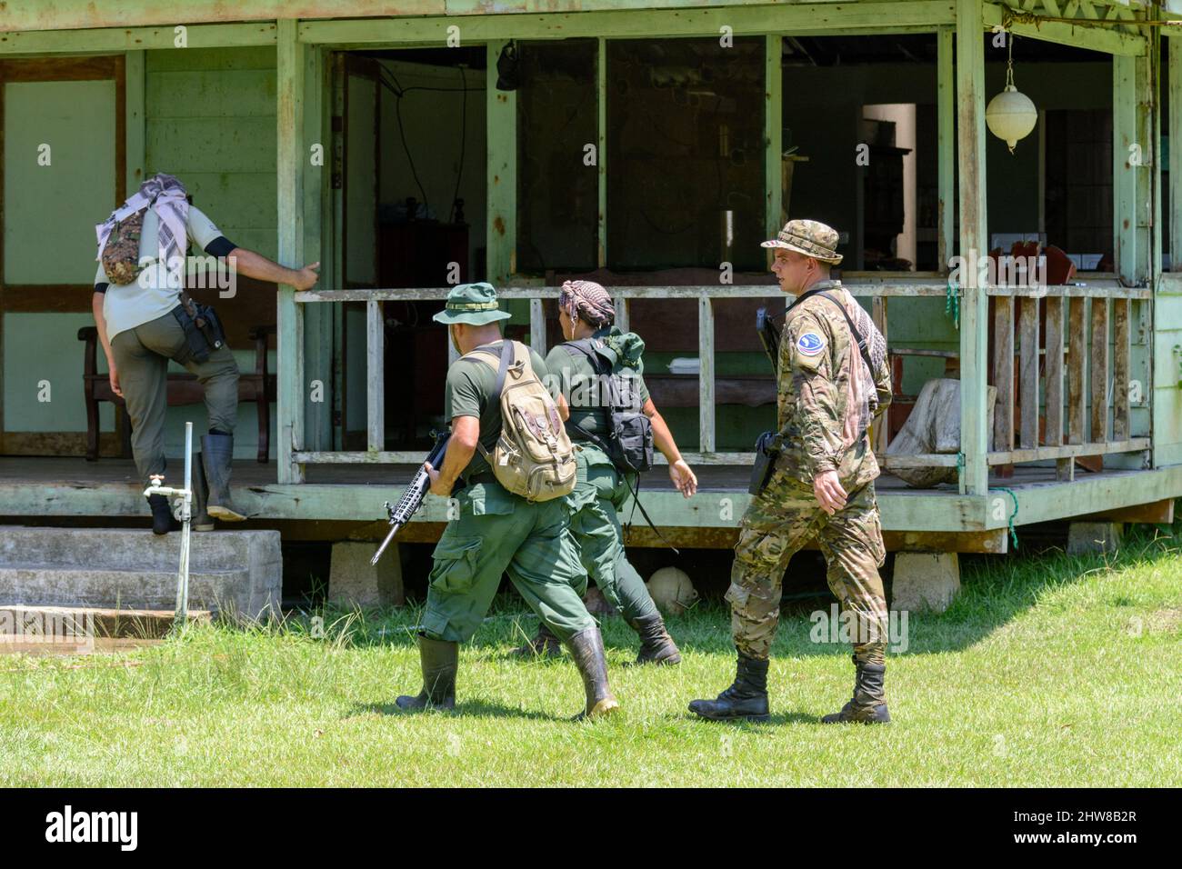 Armed park rangers on patrol in Corcovado National Park, Osa Peninsula ...