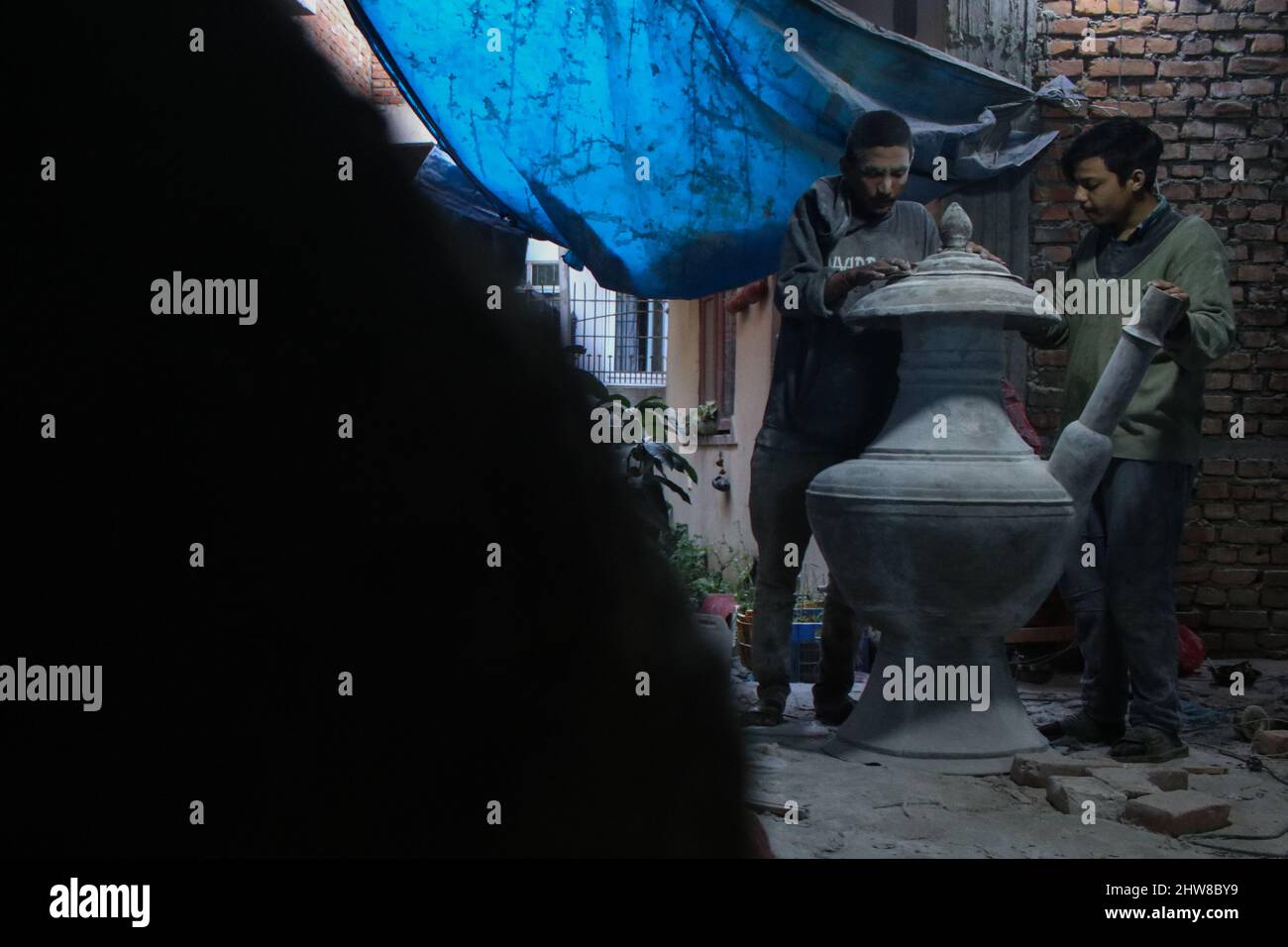 Mens make sample structure of traditional Water pot with molded wax ...