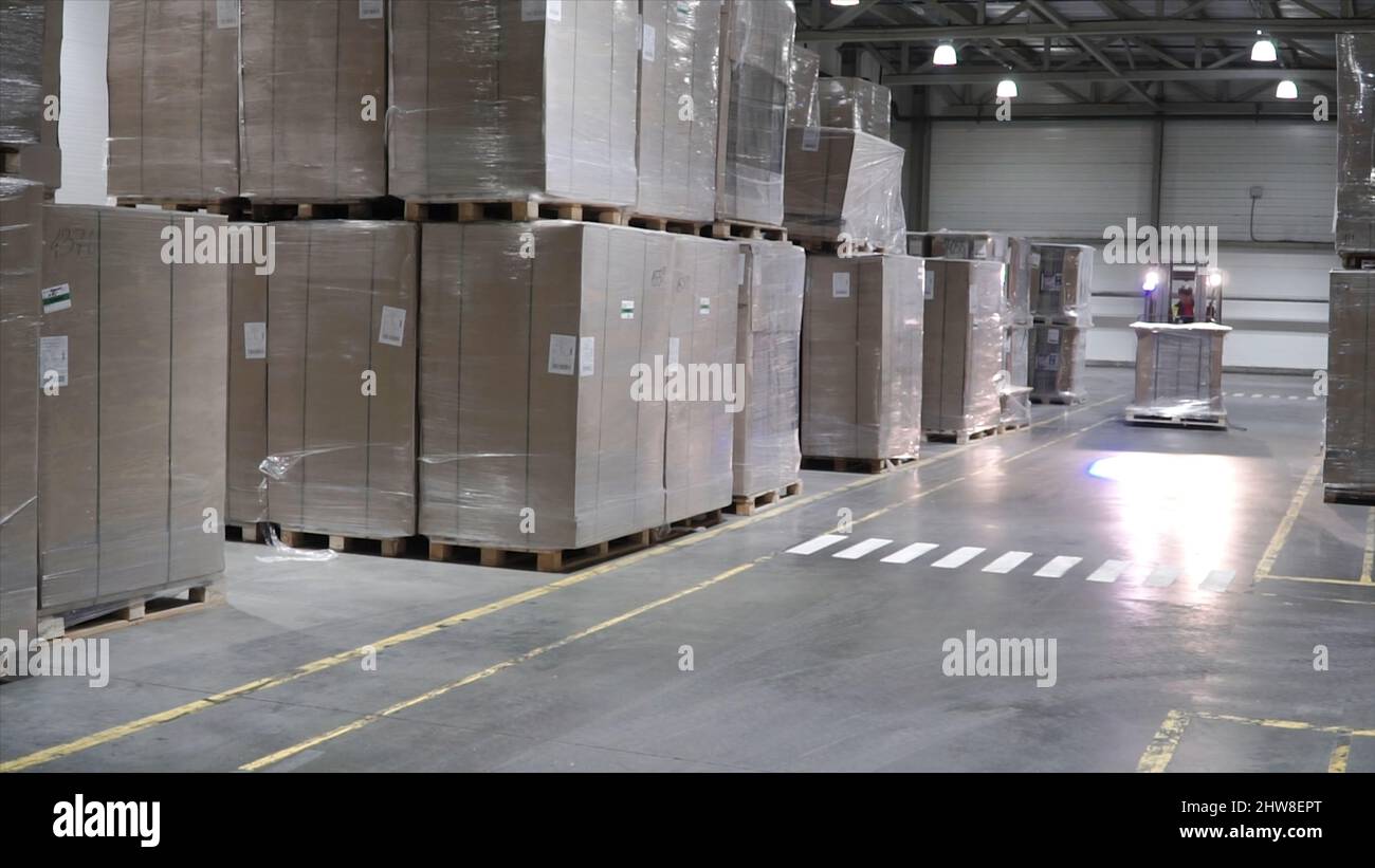 Lift truck in factory. Clip. Wholesale logistic, loading, shipment and ...