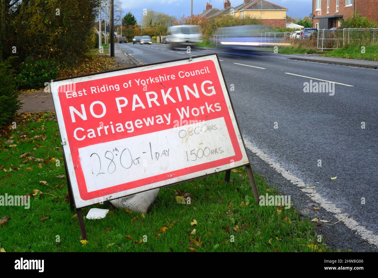 traffic passing no parking warning sign of roadworks bubwith yorkshire ...
