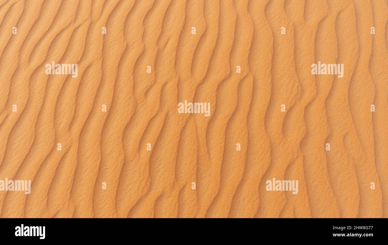 Orange desert sand texture used for the backgrounds Stock Photo - Alamy