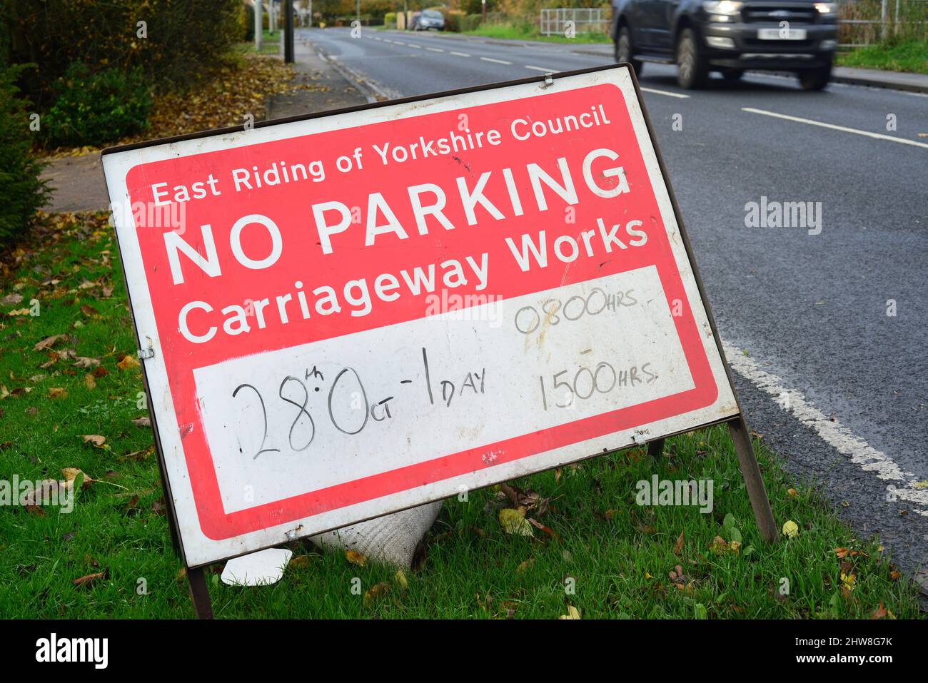 traffic passing no parking warning sign of roadworks bubwith yorkshire ...