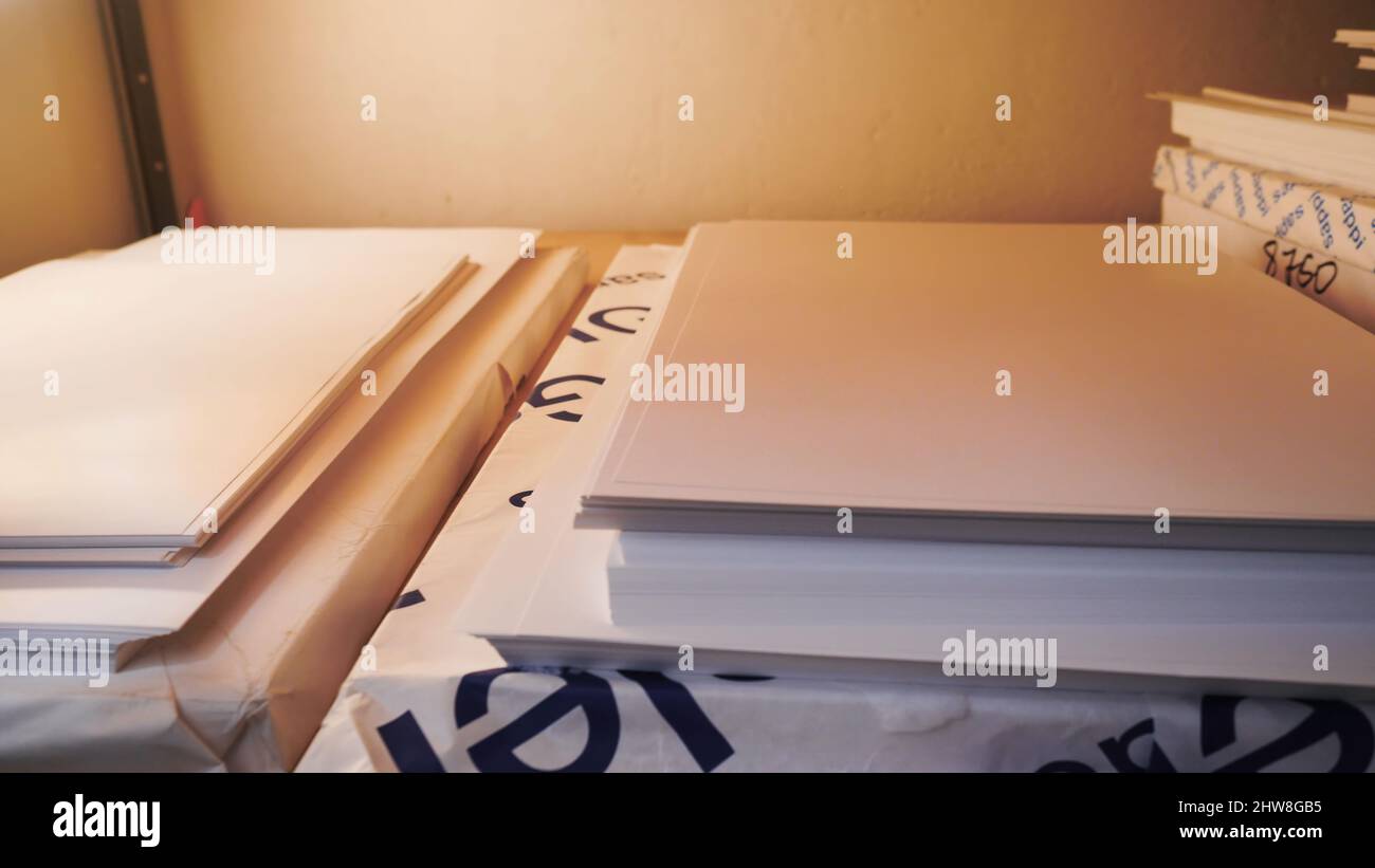 Close-up of large stacks of clean white paper. Stock footage. Stocks of ...