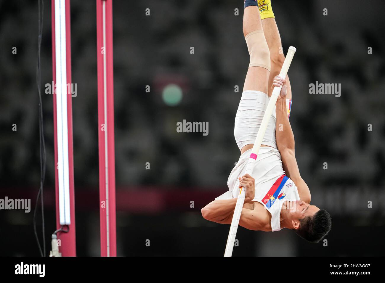 Ernest John Obiena participating in the Tokyo 2020 Olympics in the pole vault discipline Stock ...