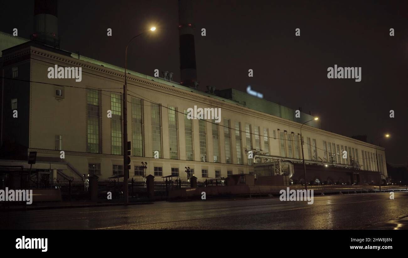 Facade of factory at night. Scene. Appearance of small factory with ...