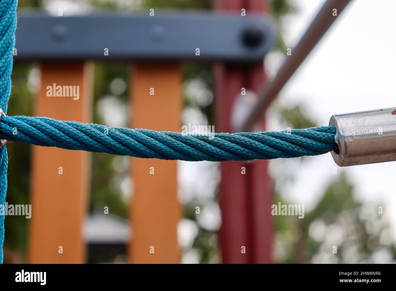 Closeup of blue climbing rope in playground Stock Photo - Alamy