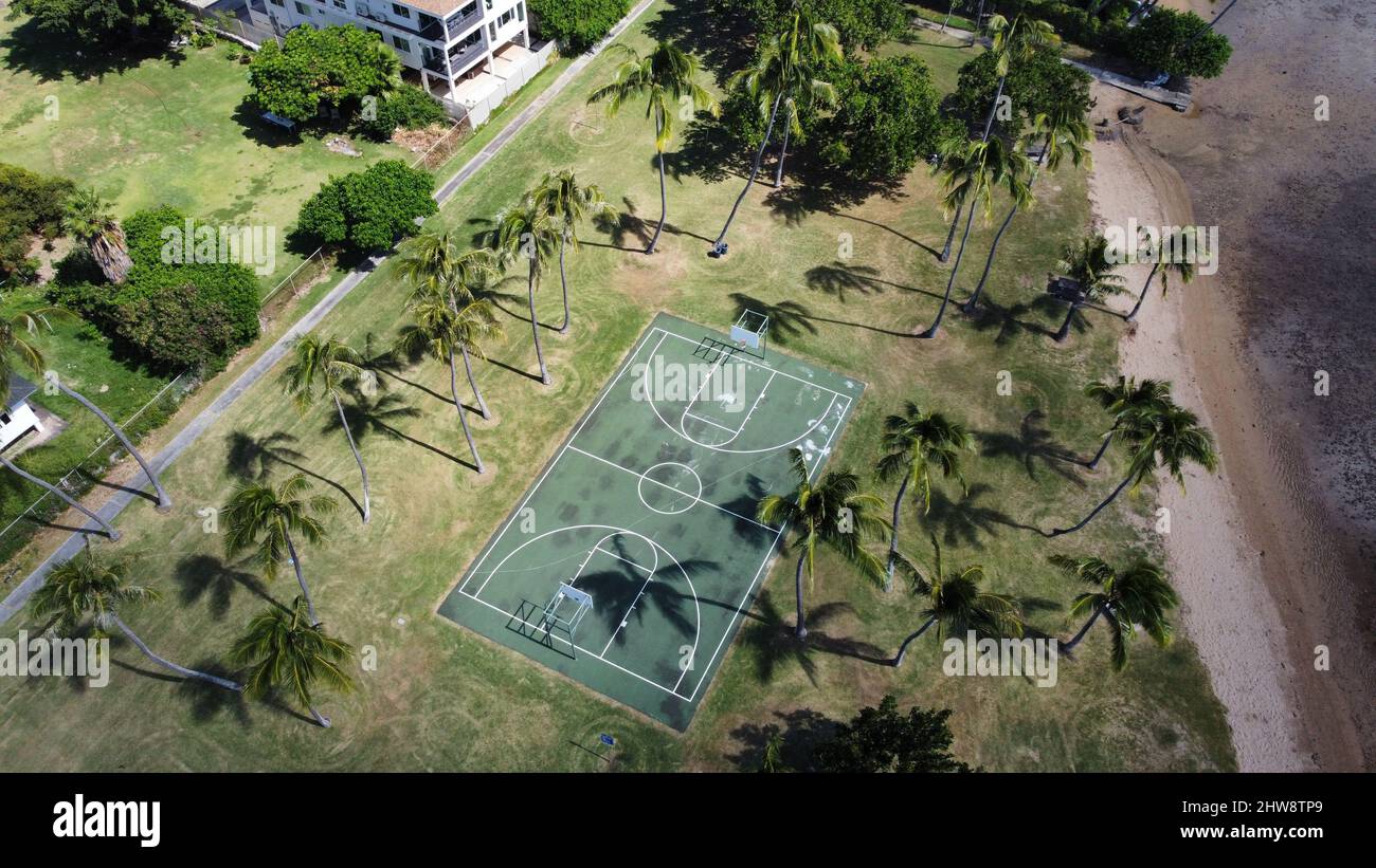 Basketball court in a tropical coast Stock Photo - Alamy