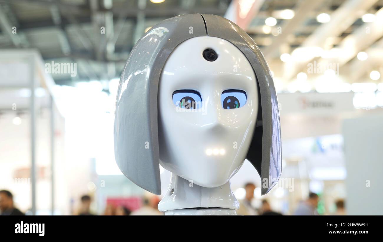 Woman's face on a high-tech robot. Media. High-tech robot at the ...