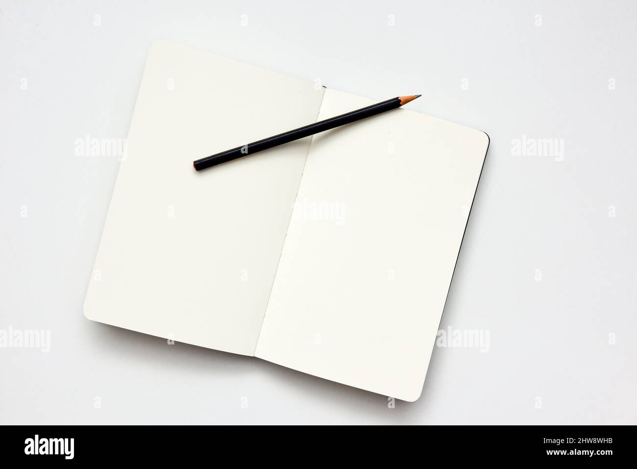 Blank note book with pencil on open page Stock Photo - Alamy