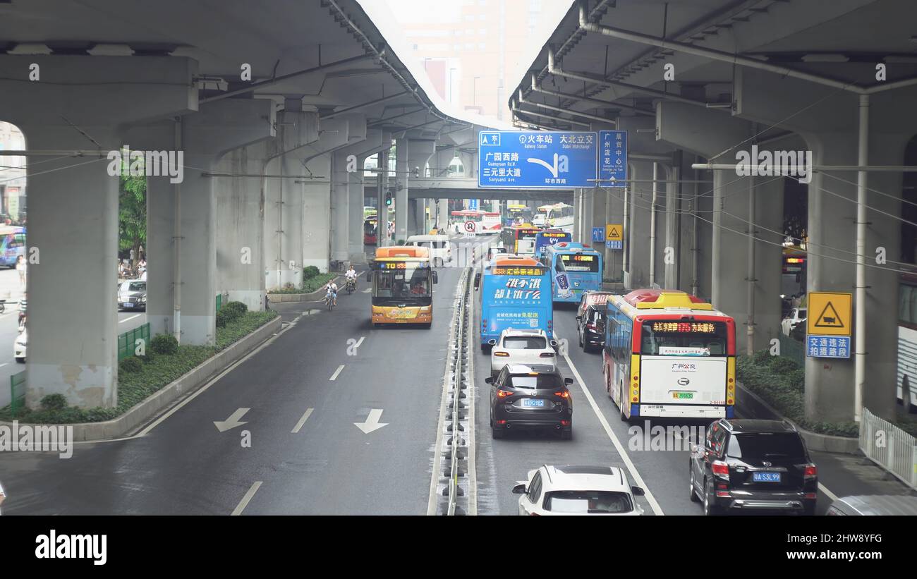 Guangzhou, China - May, 2019: Urban highway with traffic under bridges ...