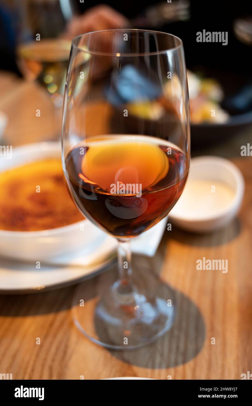 Sweet digestif muscat wine served after dinner in restaurant Stock ...