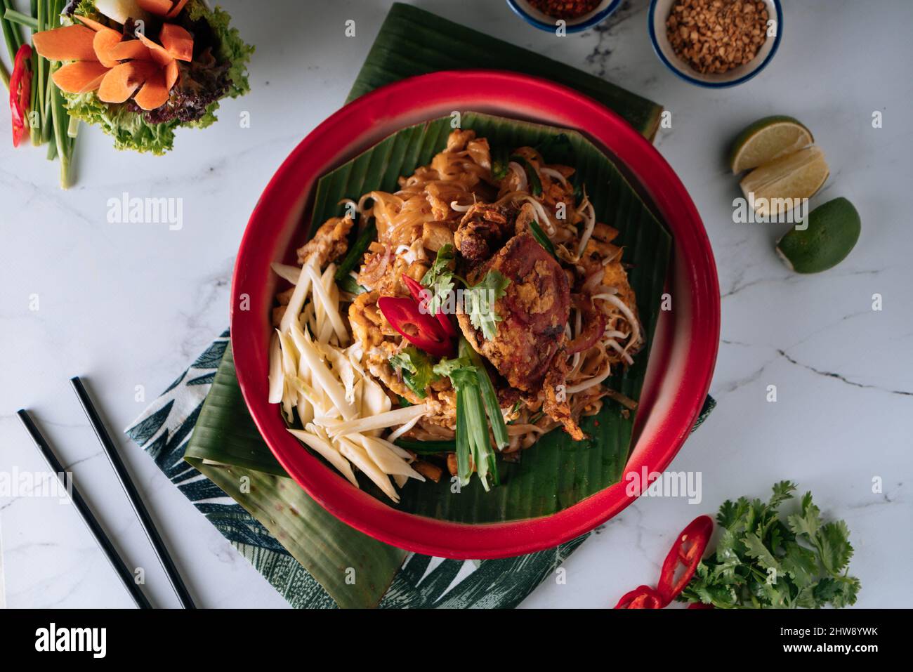 Pad Thai Soft Shell Crab noodle with red chilli in a dish isolated on ...