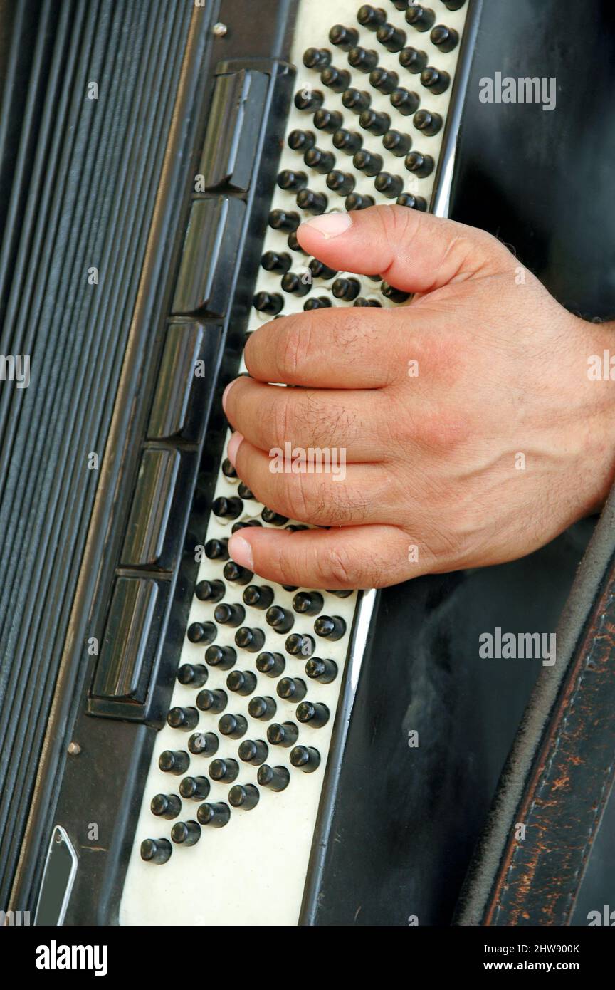 Hand accordion buttons hi-res stock photography and images - Alamy
