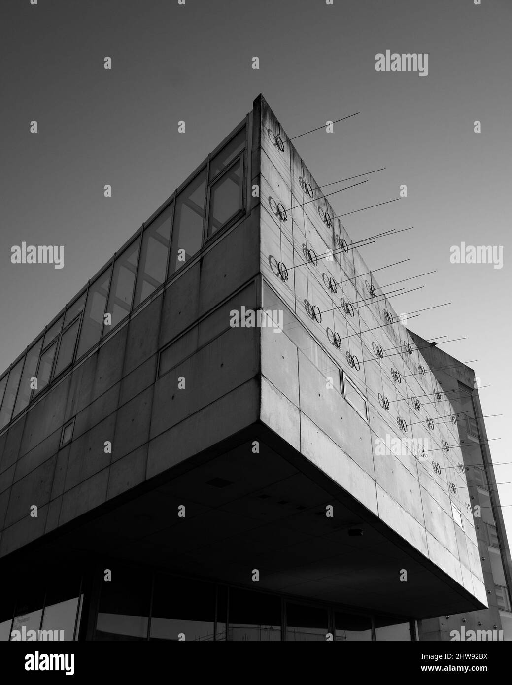 Vertical low angle shot of the modern building in black and white Stock ...