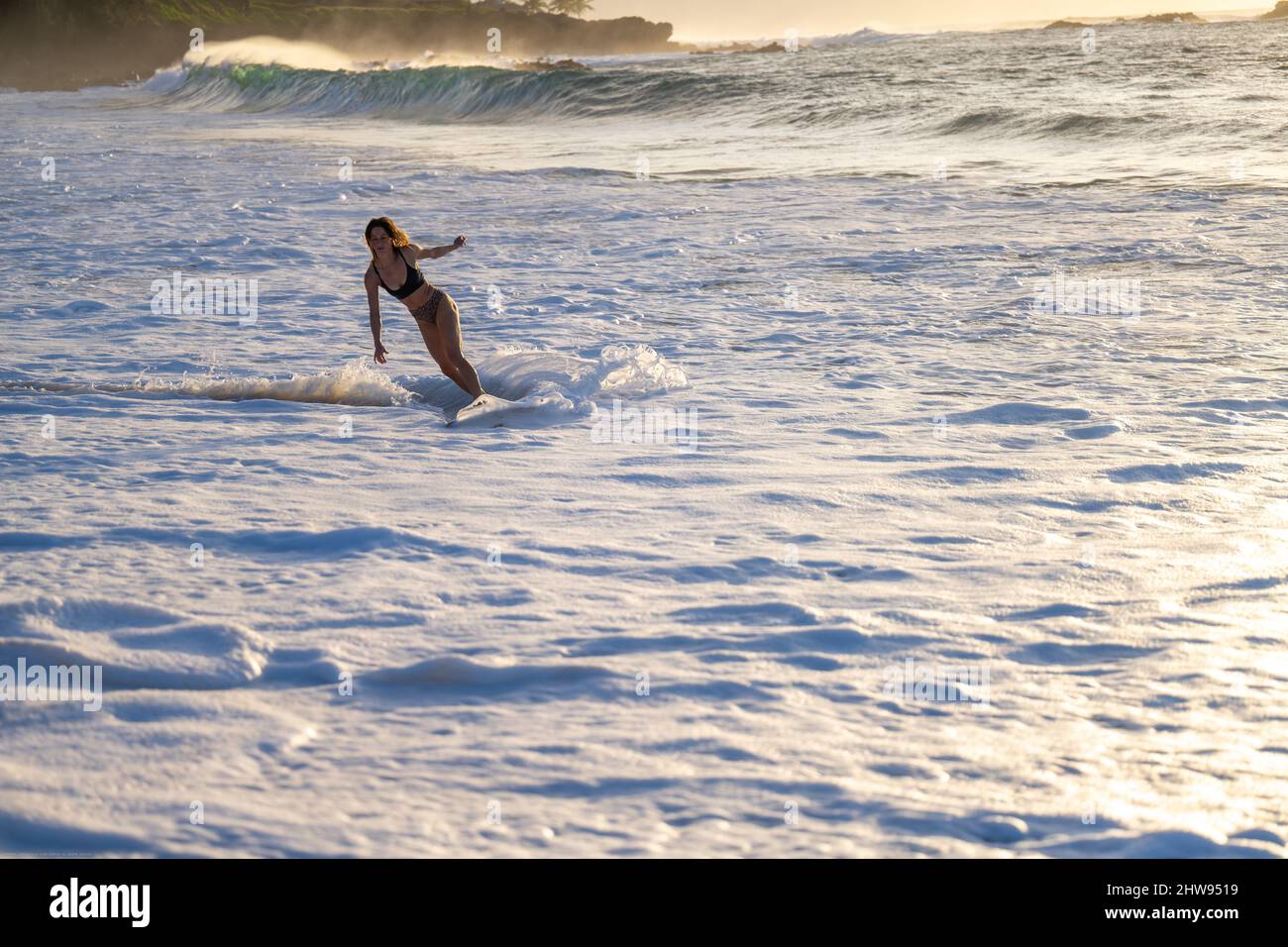 Sunset beach honolulu surfing hi-res stock photography and images - Alamy