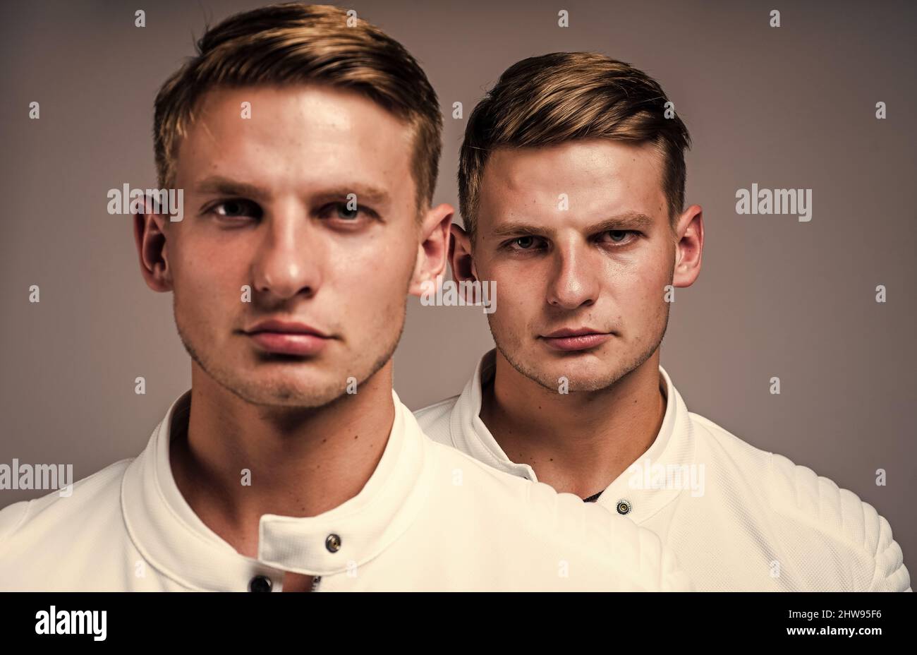 young twin brothers with similar appearance, twins Stock Photo - Alamy